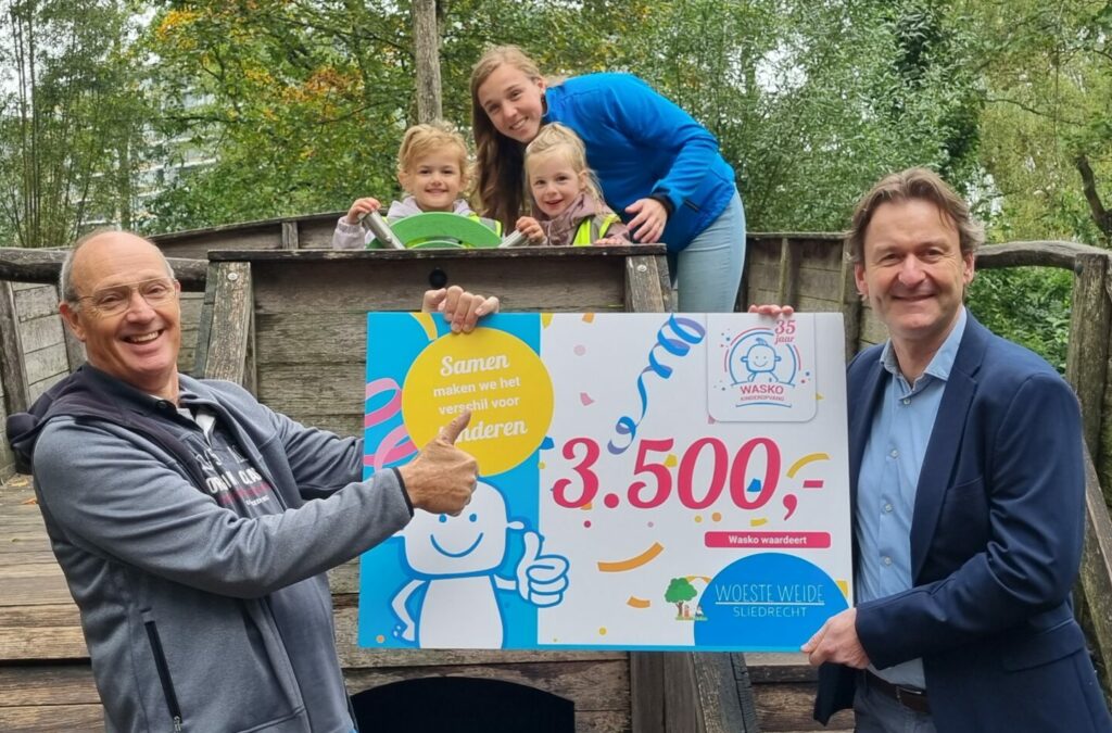 Wasko bestaat 35-jaar; cheque voor natuurspeeltuin De Woeste Weide ...